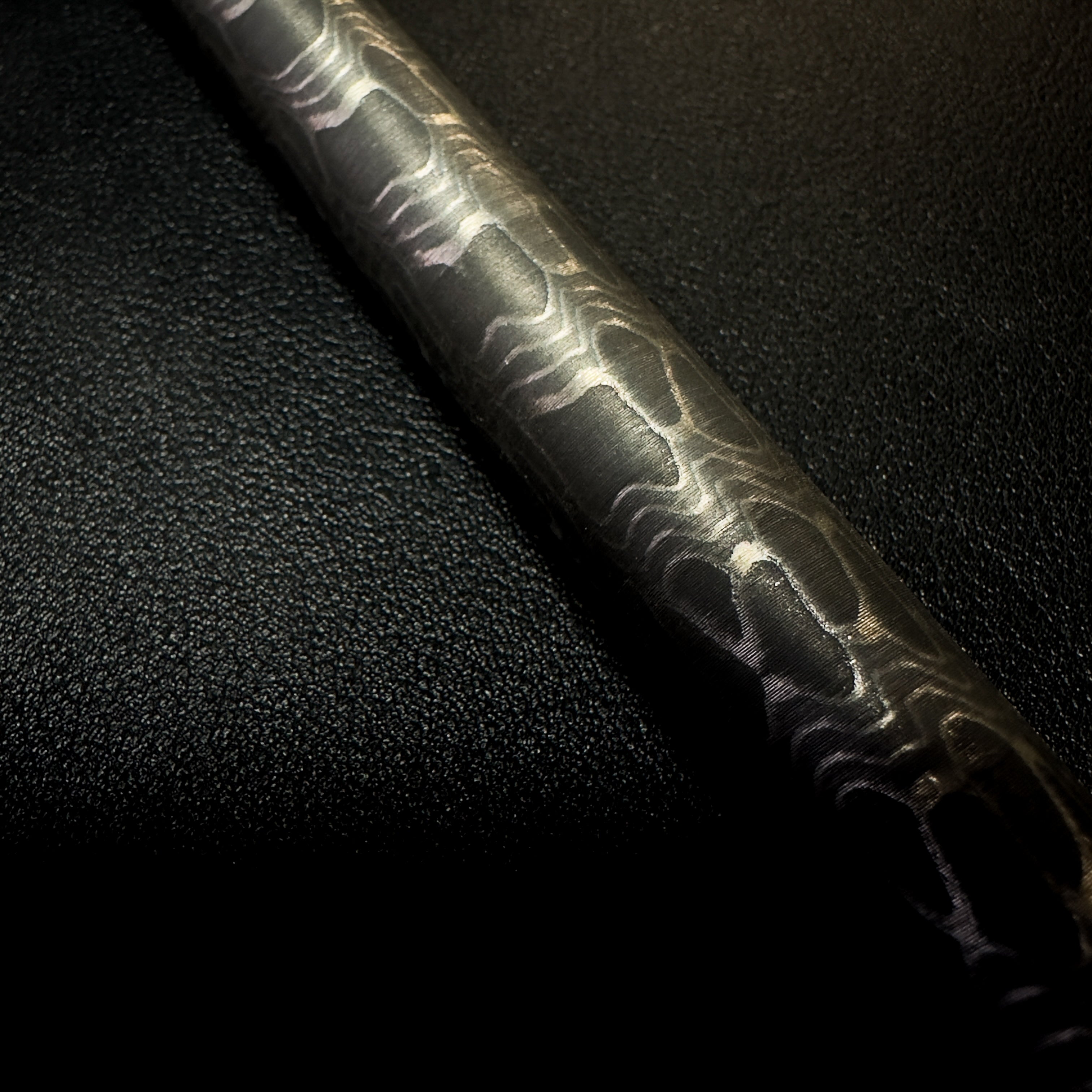 Reverse Reptilian Damascus Round Bar – Stainless Steel | Vegas Forge